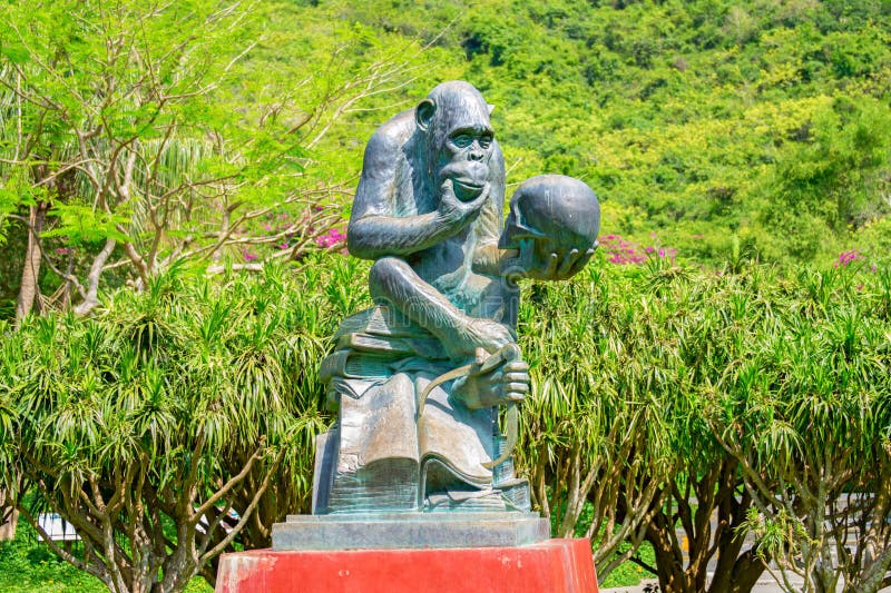 Monkey Statue Made of Stone, in the Pose of Sensible Over the Human ...