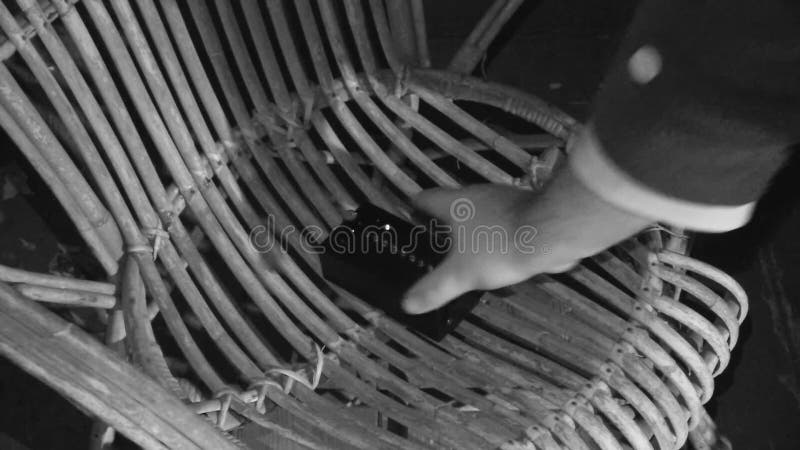 A ghost device on a chair stock video. Video of scene - 111478493