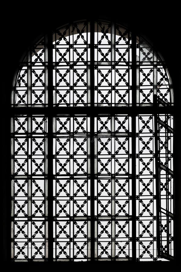 Arched Window with Decorative Grate Stock Image - Image of vertical ...