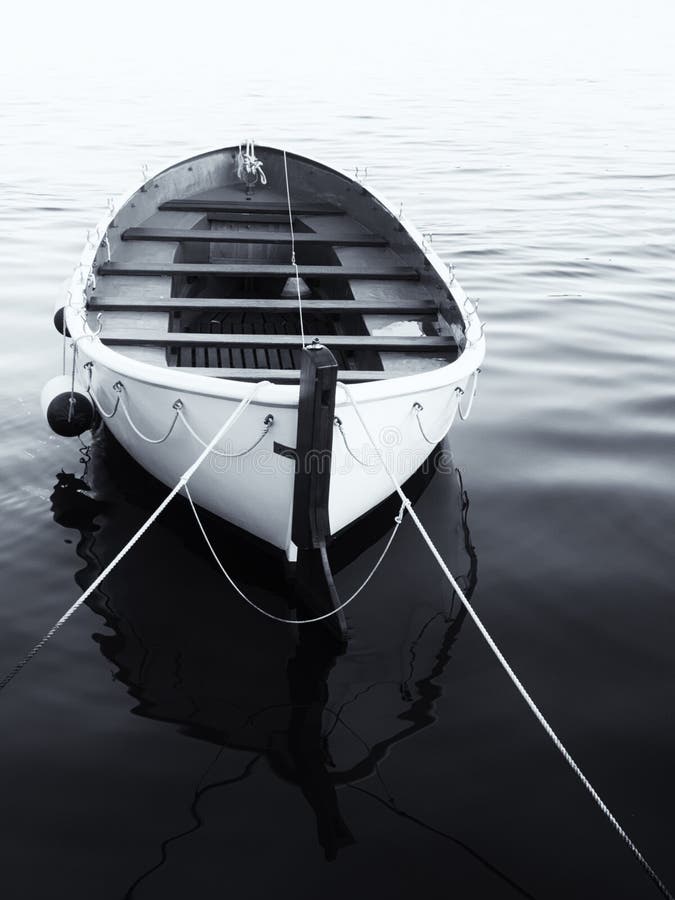Monochrome Image of an Empty Rowboat in the Water Stock Image - Image ...