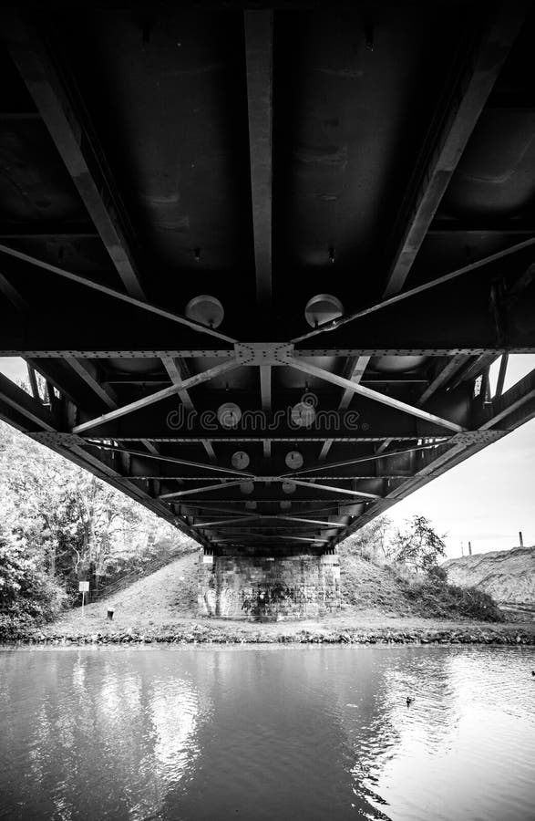 Monochrome Shot of a Bridge Over the River Stock Image - Image of shot ...