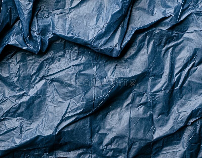 The Monochrome Texture of a Black Crumpled Plastic Bag Forms the ...