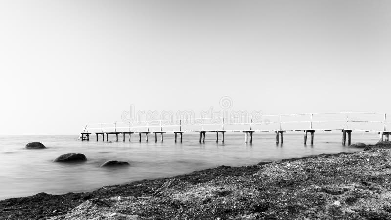 Monochrome Wooden Bathing Jetty Stock Image - Image of black, rock ...