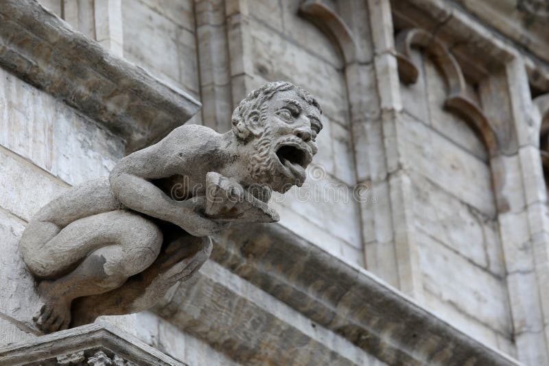 Monstrous Statue with Human Features Called Gargoyle on the Historic ...