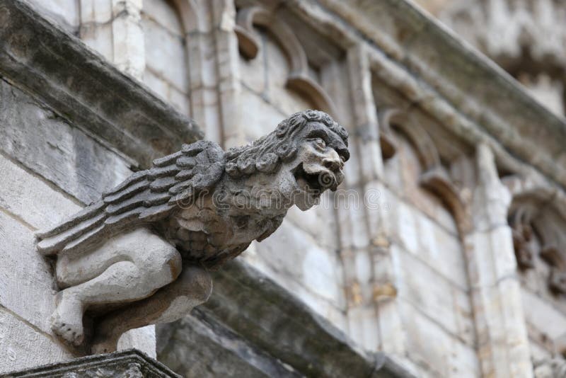 Monstrous Statue with almost Human Features Called Gargoyle on T Stock ...