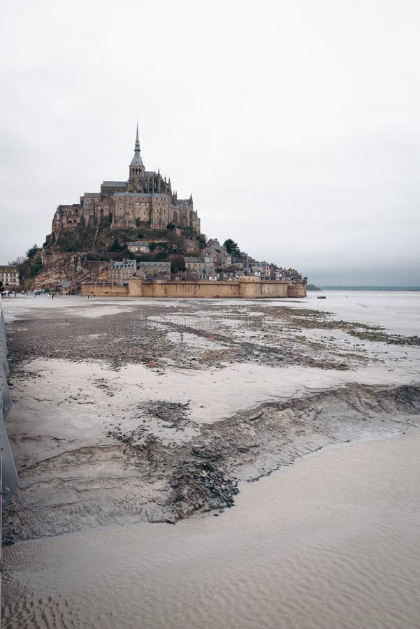 Mont Saint Michel Abbey With Blue Sky And Low Tide Stock Image - Image ... Mont Saint Michel Abbey With Blue Sky And Low Tide Stock Image - Image ...