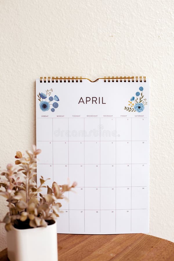 Month of April Calenday Page with Empty Dates on the Table with House ...