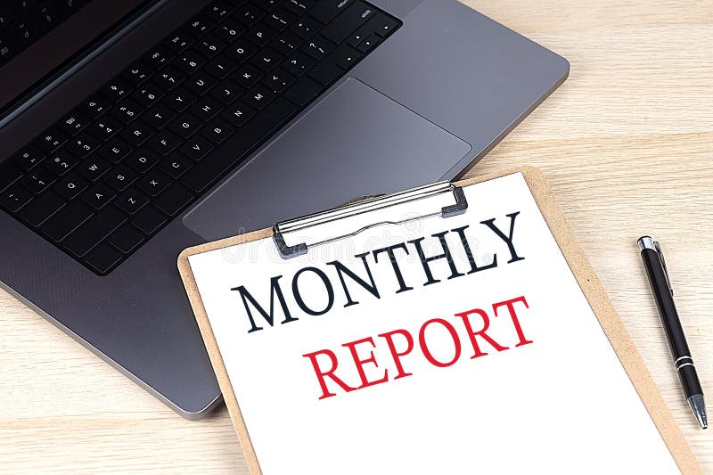MONTHLY REPORT Text Written on a Paper Clipboard on Laptop Stock Image ...