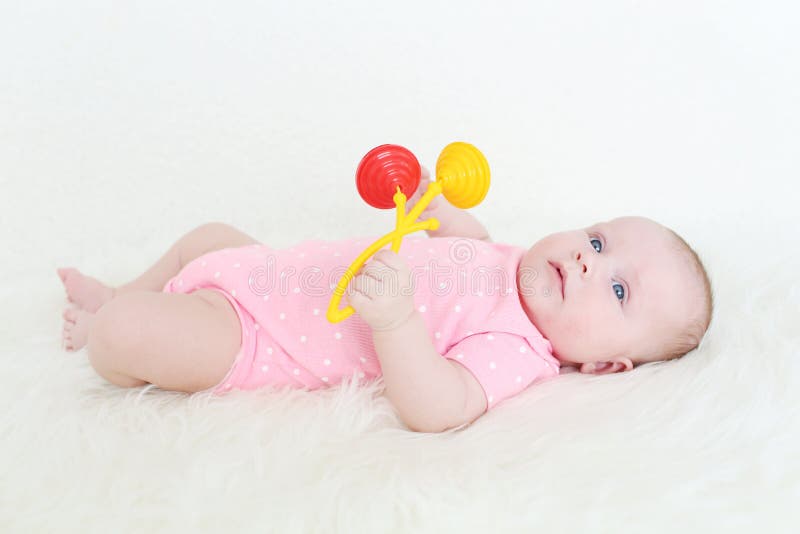 3 Months Baby Girl with Rattle Stock Photo - Image of person, playing ...