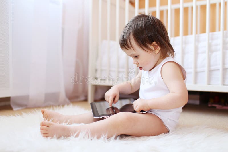 18 Months Baby with Tablet Computer at Home Stock Photo - Image of ...