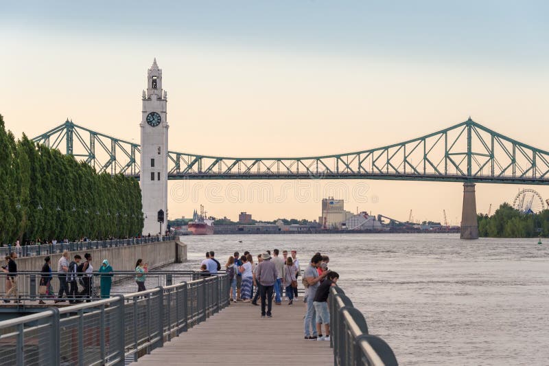 Montreal Clock Tower and Jacques Cartier Bridge at Sunset in Summer ...