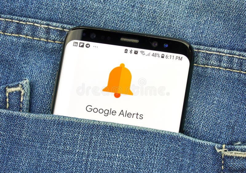 Google Alerts on a Phone Screen in a Pocket Editorial Photography ...