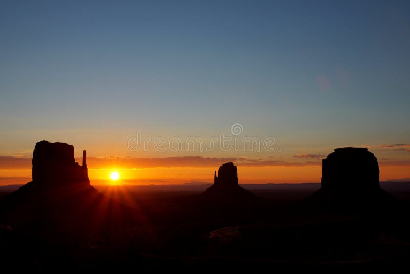 Monument Valley at sunrise stock image. Image of landscape - 26303131