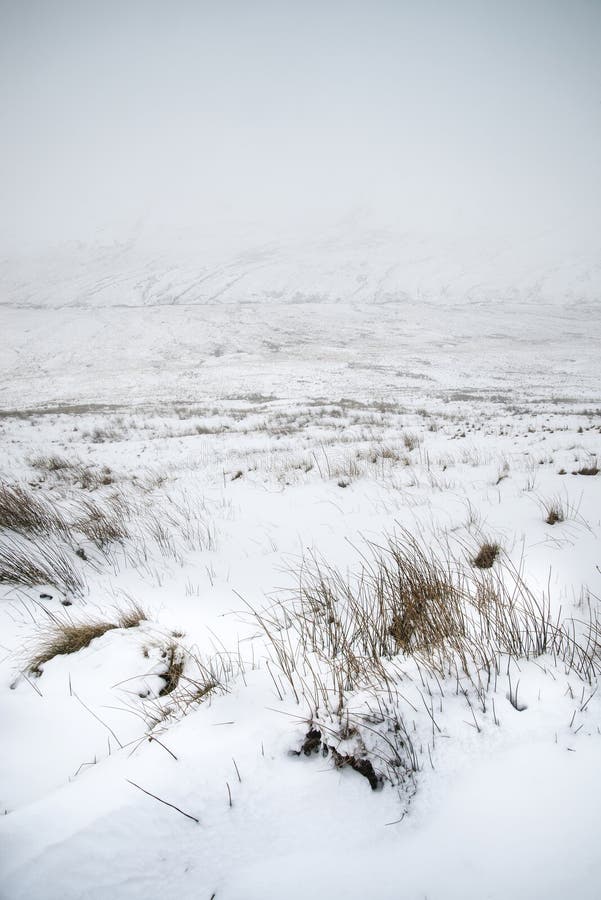 Moody Dramatic Low Cloud Winter Landscape in Mountains with Snow Stock ...