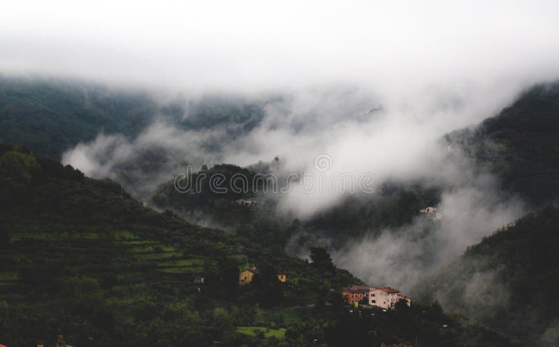 Moody Dramatic Mountainside Panorama in the Clouds Stock Photo - Image ...