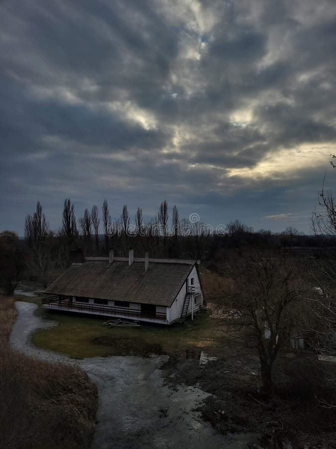 Moody sky with old barn stock photo. Image of sunlight - 314909832