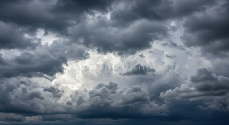 Moody Storm Clouds Fill the Sky, Hinting at a Coming Rain and a ...