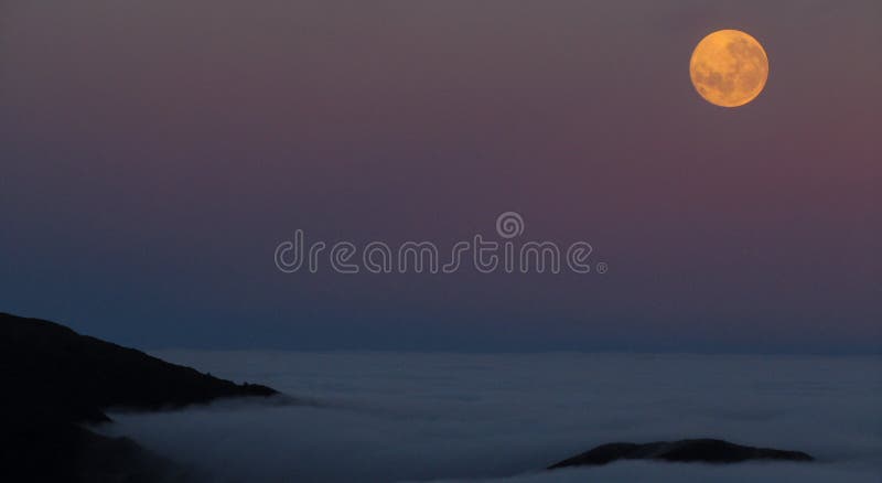 The Moon above the clouds stock photo. Image of awesome - 66237172