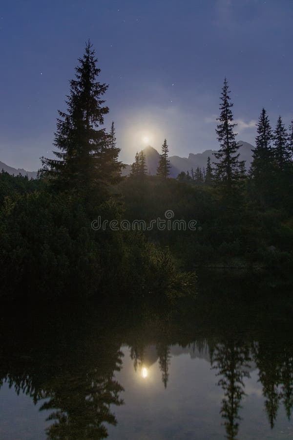 Moon Above Mountains and Lake at Night Stock Photo - Image of rockies ...