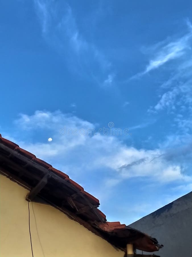 Moon in the afternoon stock image. Image of vehicle - 221989029