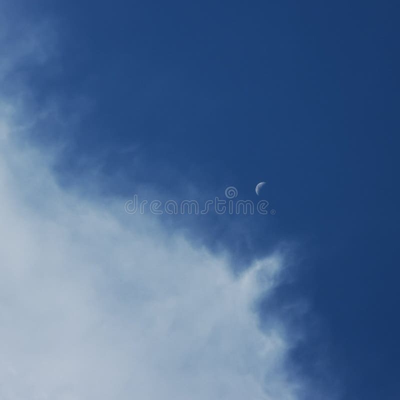 Moon in the Afternoon Against Blue Skies Stock Image - Image of skies ...