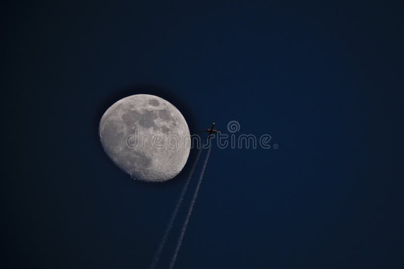 Moon and Airplane in the Sky with Contrail Stock Photo - Image of ...