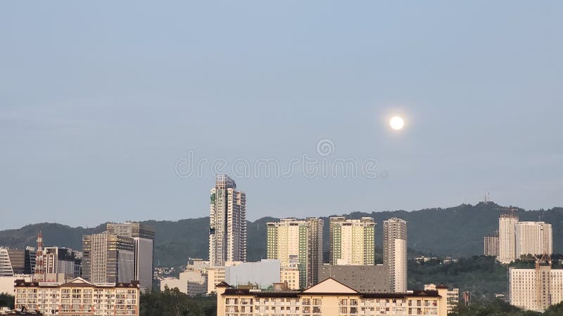 The Moon Also Rises in Cebu City, Philippines Stock Image - Image of ...