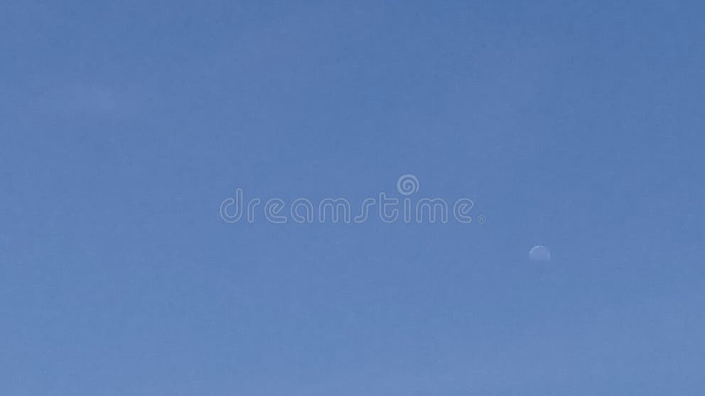 The moon appears at noon stock image. Image of noon - 322751049