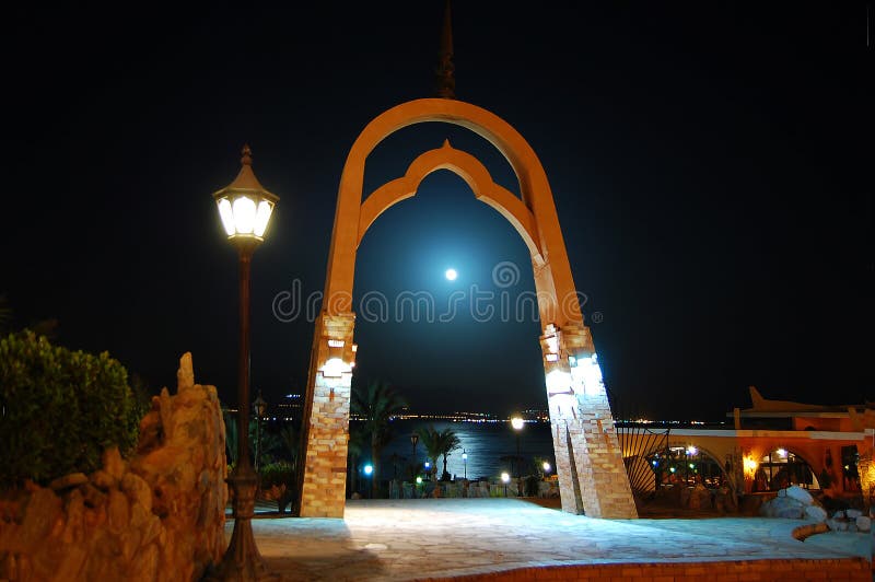 Moon in the arch stock photo. Image of lamp, egypt, hotel - 12953512