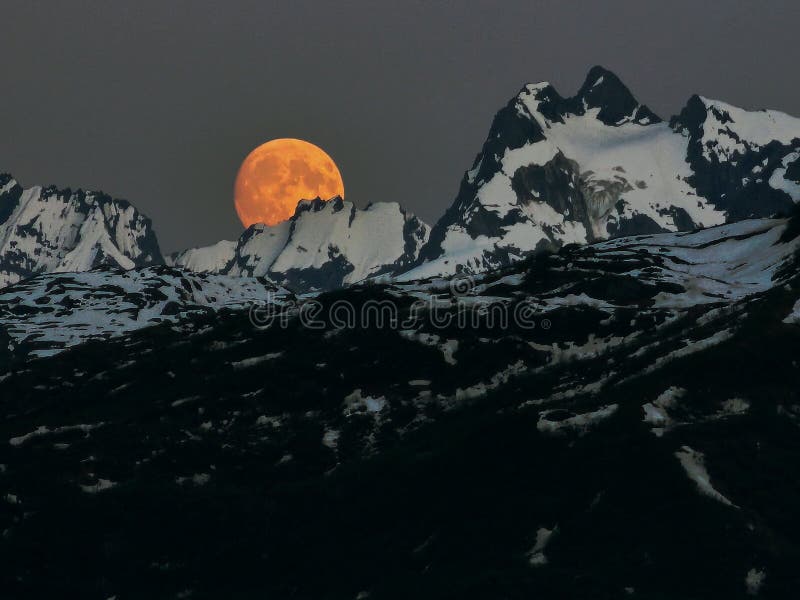 Moon Behind the Snowy Mountains in Alaska Stock Photo - Image of harbor ...