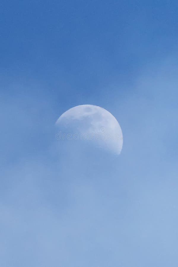 Moon in the blue sky stock photo. Image of twilight - 273511438