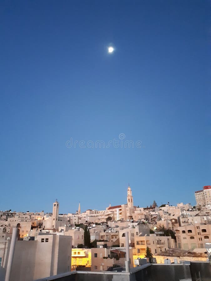 The Moon in the Blue Sky Over Bethlehem. Stock Photo - Image of moon ...
