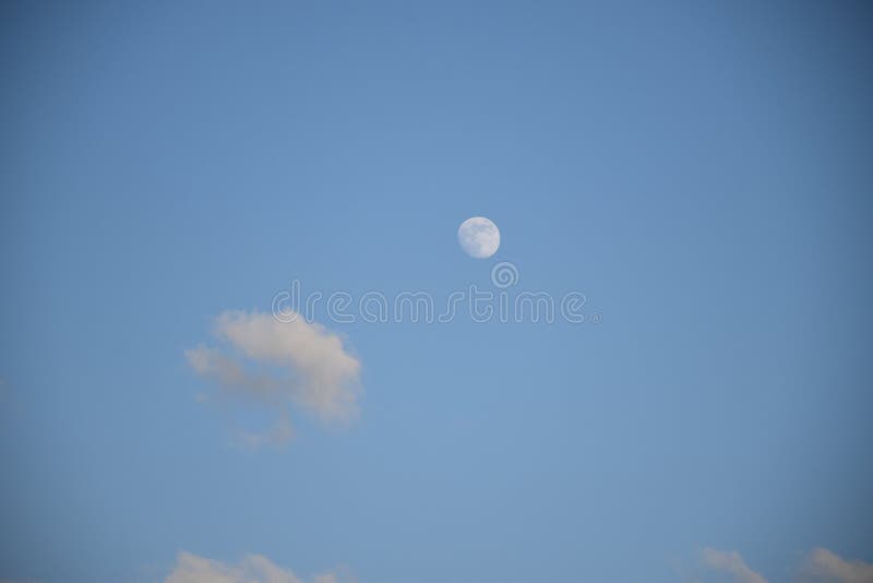 Moon in the blue sky stock photo. Image of celestial - 96321200