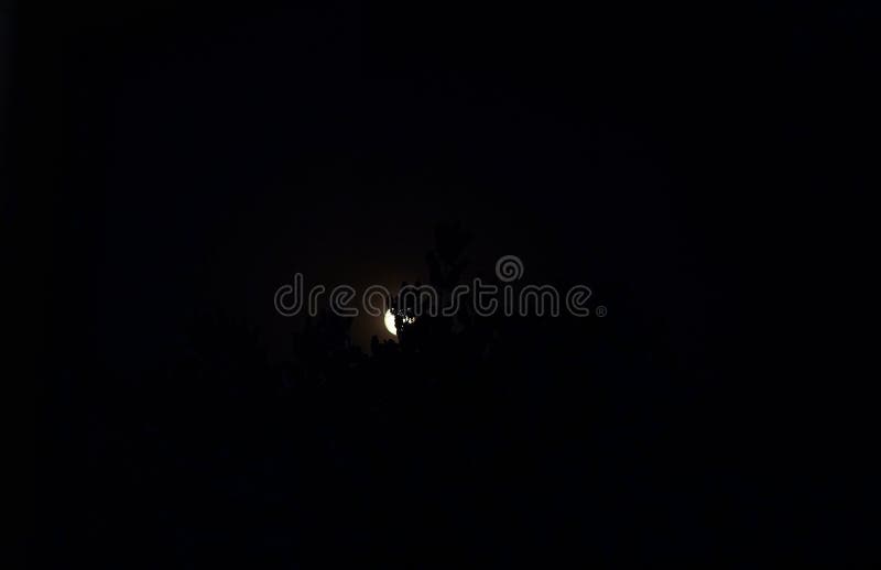 The moon at sunset stock image. Image of cloudscape - 250804337