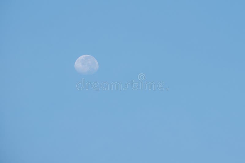 Moon in the Bright Blue Sky with Negative Space Stock Image - Image of ...