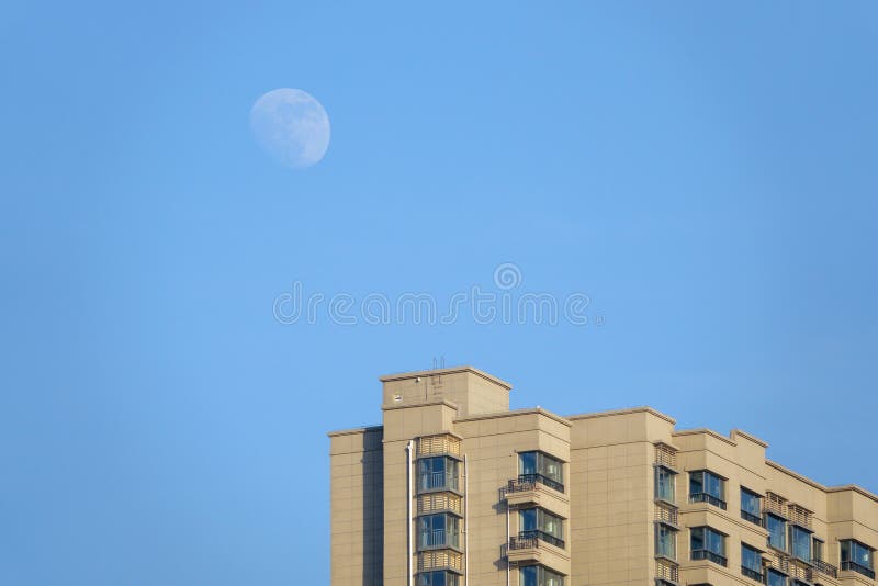Moon and building stock photo. Image of celestial, skies - 141056678