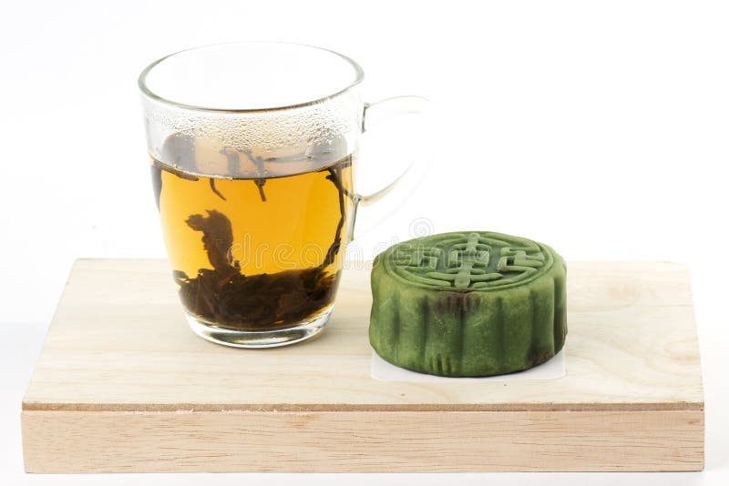 Moon Cake with Matcha and Cup of Tea Stock Photo - Image of cake ...
