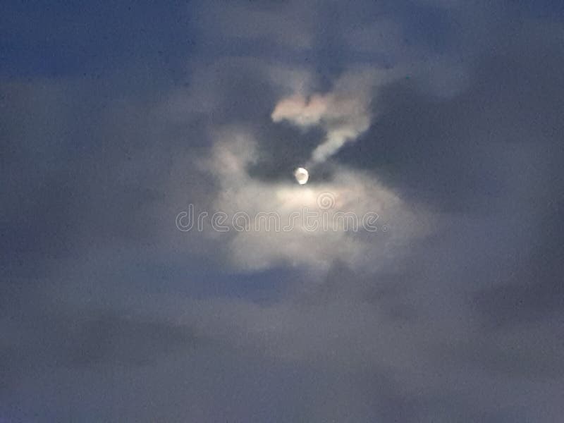 Moon between Clouds stock image. Image of lunar, light - 96641173