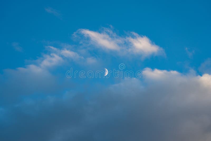 Moon among the Clouds in the Daytime Sky Stock Image - Image of cloudy ...