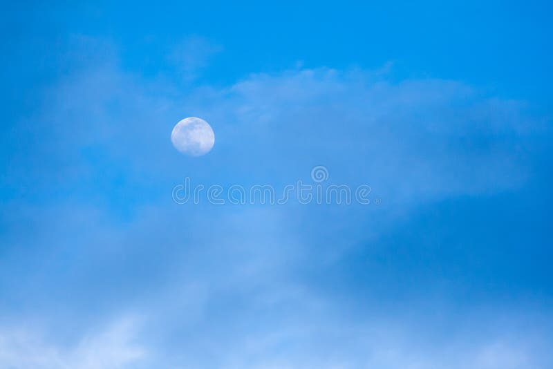 Moon Covered by Clouds in Broad Daylight Stock Image - Image of moon ...