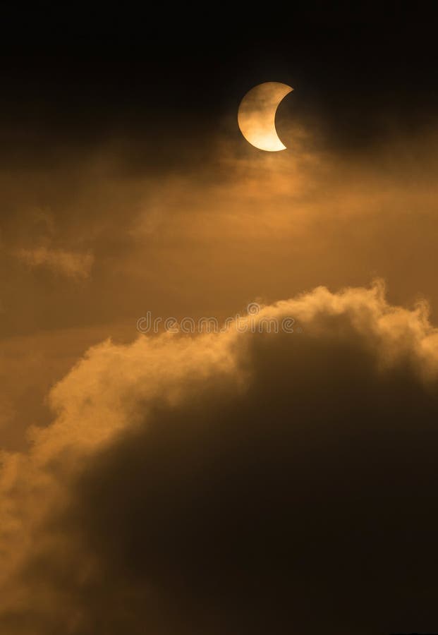 The Moon Covering the Sun in a Partial Eclipse Stock Photo - Image of ...