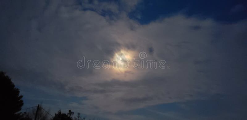 Moon stock photo. Image of evening, night, moon, clouds - 132036076