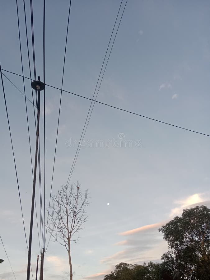 Moon in the Evening Sky when Sunset Coming Stock Image - Image of tower ...