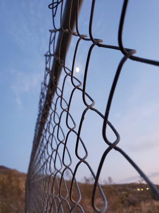 The MOON FENCE stock photo. Image of sunlight, fence - 224774252