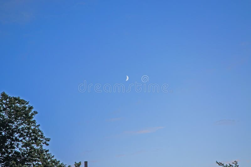 Moon glow during the day stock image. Image of business - 287048417