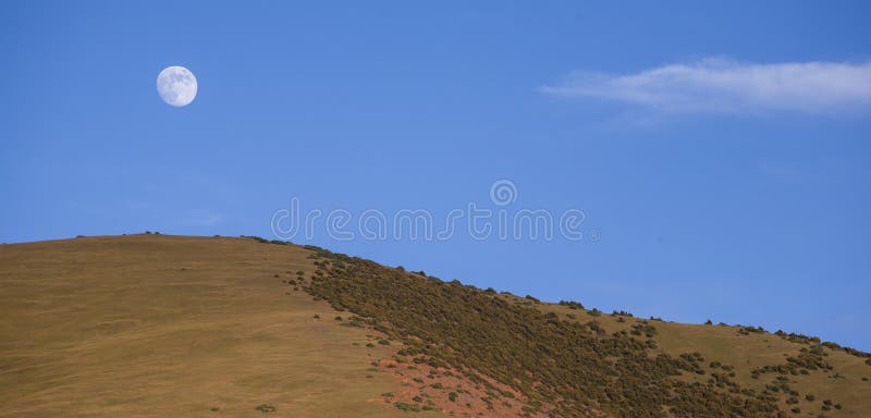 The Moon Climbing Up the Hillside Stock Image - Image of holy, hillside ...