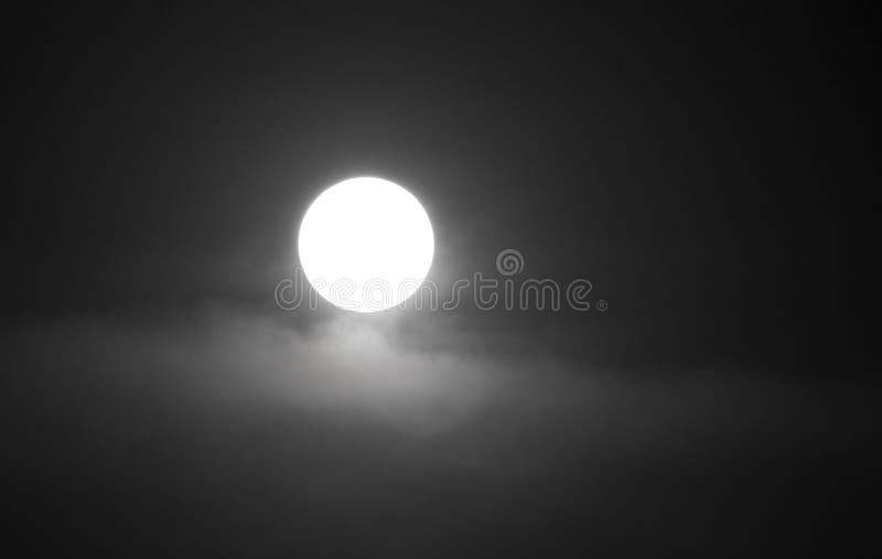 The Moon in the Haze of the Clouds at Night Stock Photo - Image of ...