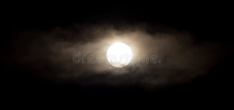 The Moon in the Haze of the Clouds at Night Stock Photo - Image of ...