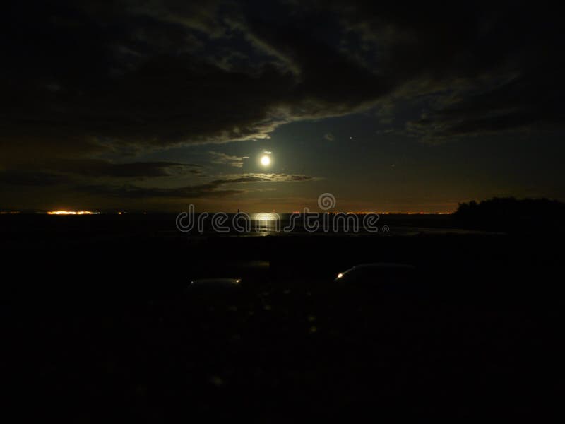 Moon lit clouds stock photo. Image of evening, distant - 105890306