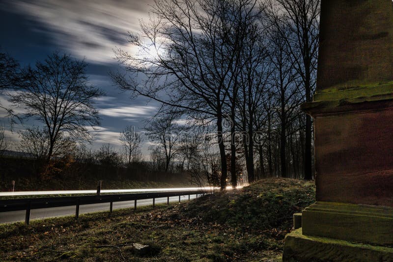 Moon on a Lonely Road at Night, Long Exposure Stock Image - Image of ...